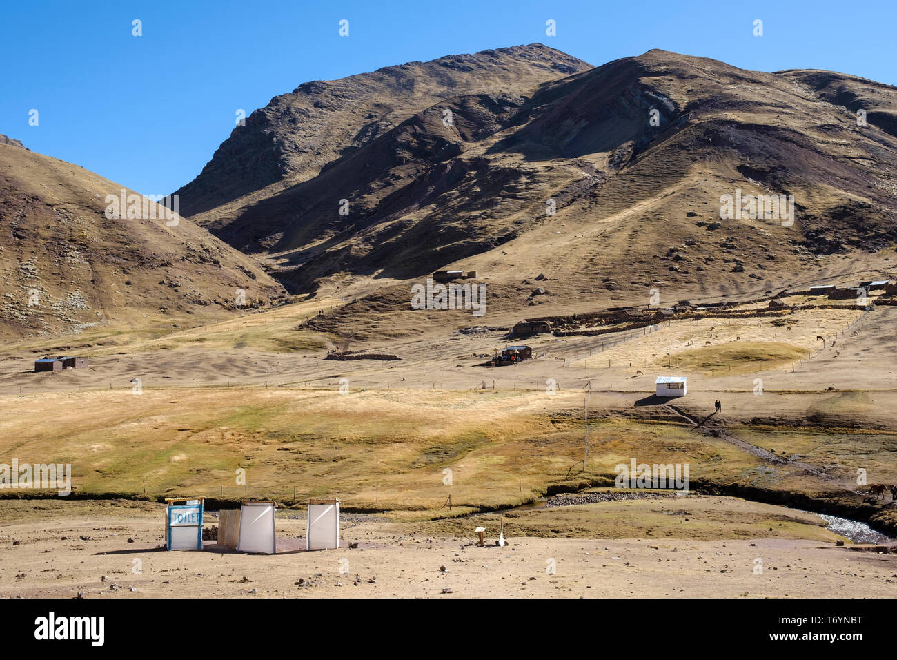 Outdoors toilets on the way to the Rainbow Mountain in Los Andes, Peru ...