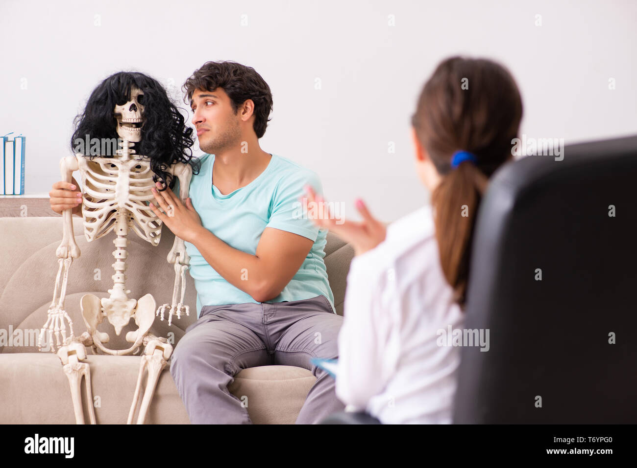 Young patient visiting psychologist for therapy Stock Photo - Alamy