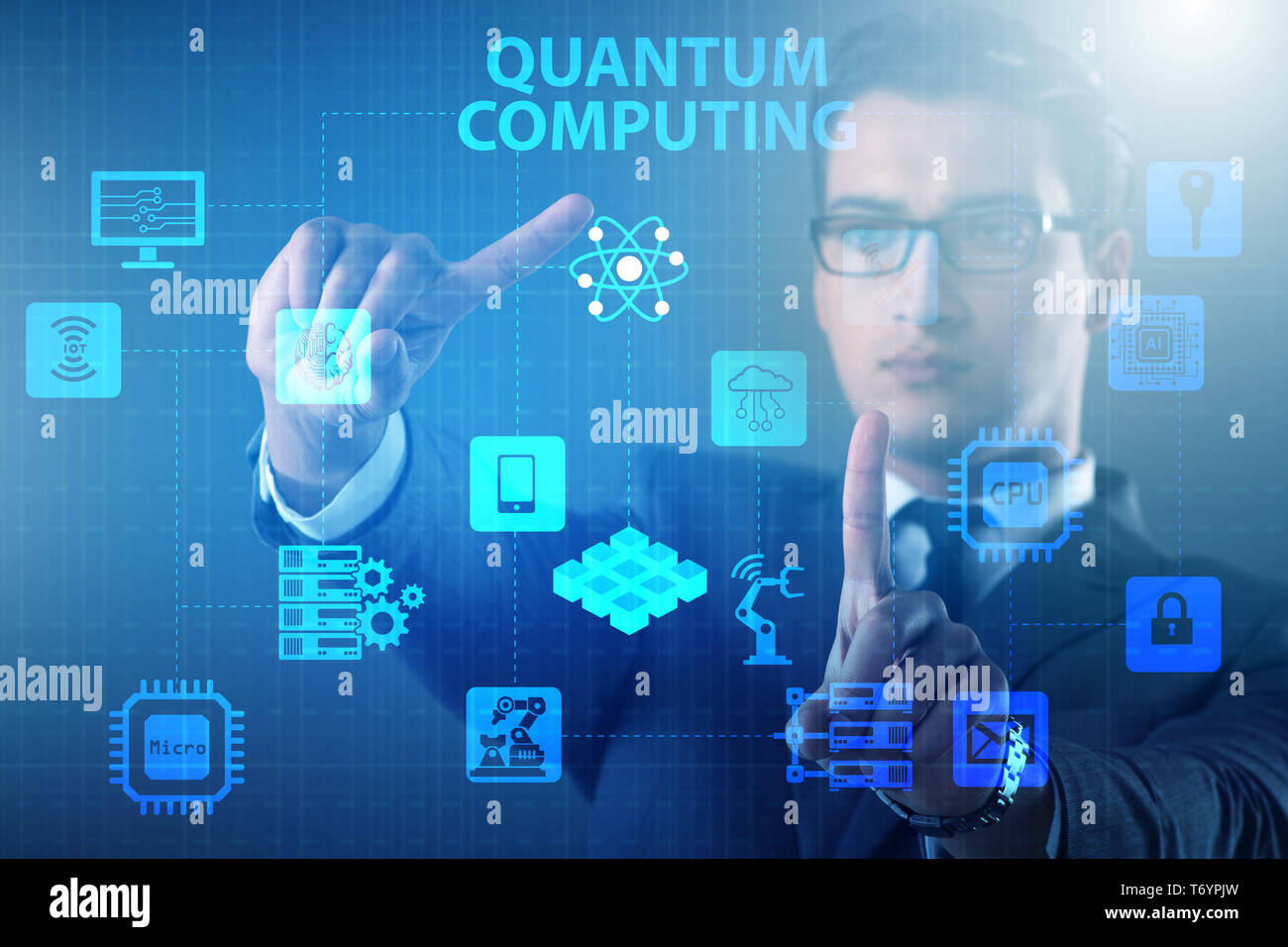 Businessman pressing virtual button in quantum computing concept Stock Photo - Alamy