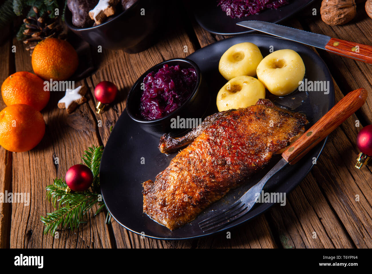 classic and crispy roasted duck with cabbage and dumplings Stock Photo ...