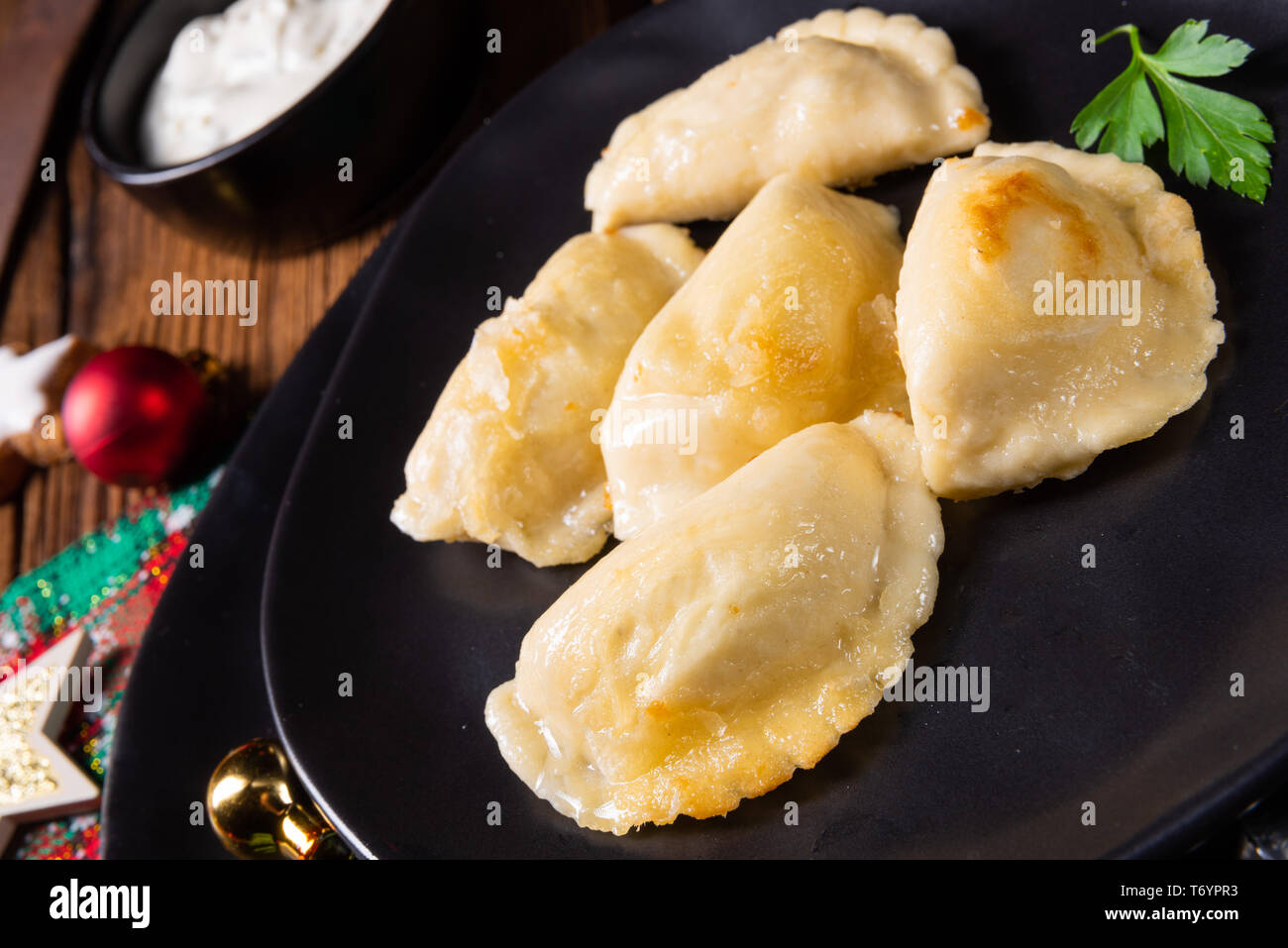 Polish Christmas pierogi with sauerkraut and mushrooms Stock Photo - Alamy