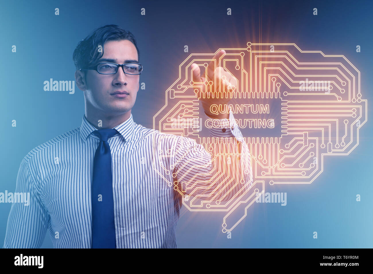 Businessman pressing virtual button in quantum computing concept Stock ...