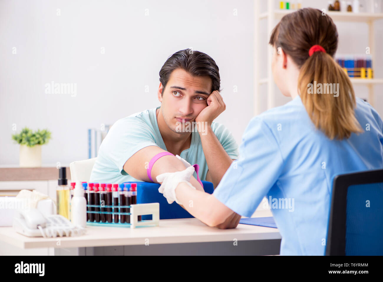 The young patient during blood test sampling procedure Stock Photo - Alamy