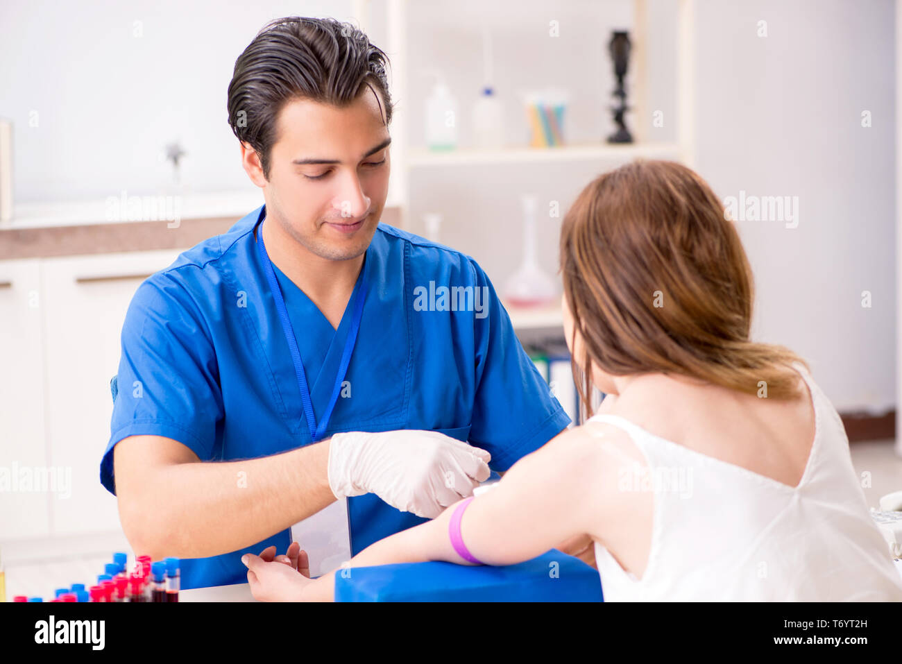 The young patient during blood test sampling procedure Stock Photo - Alamy