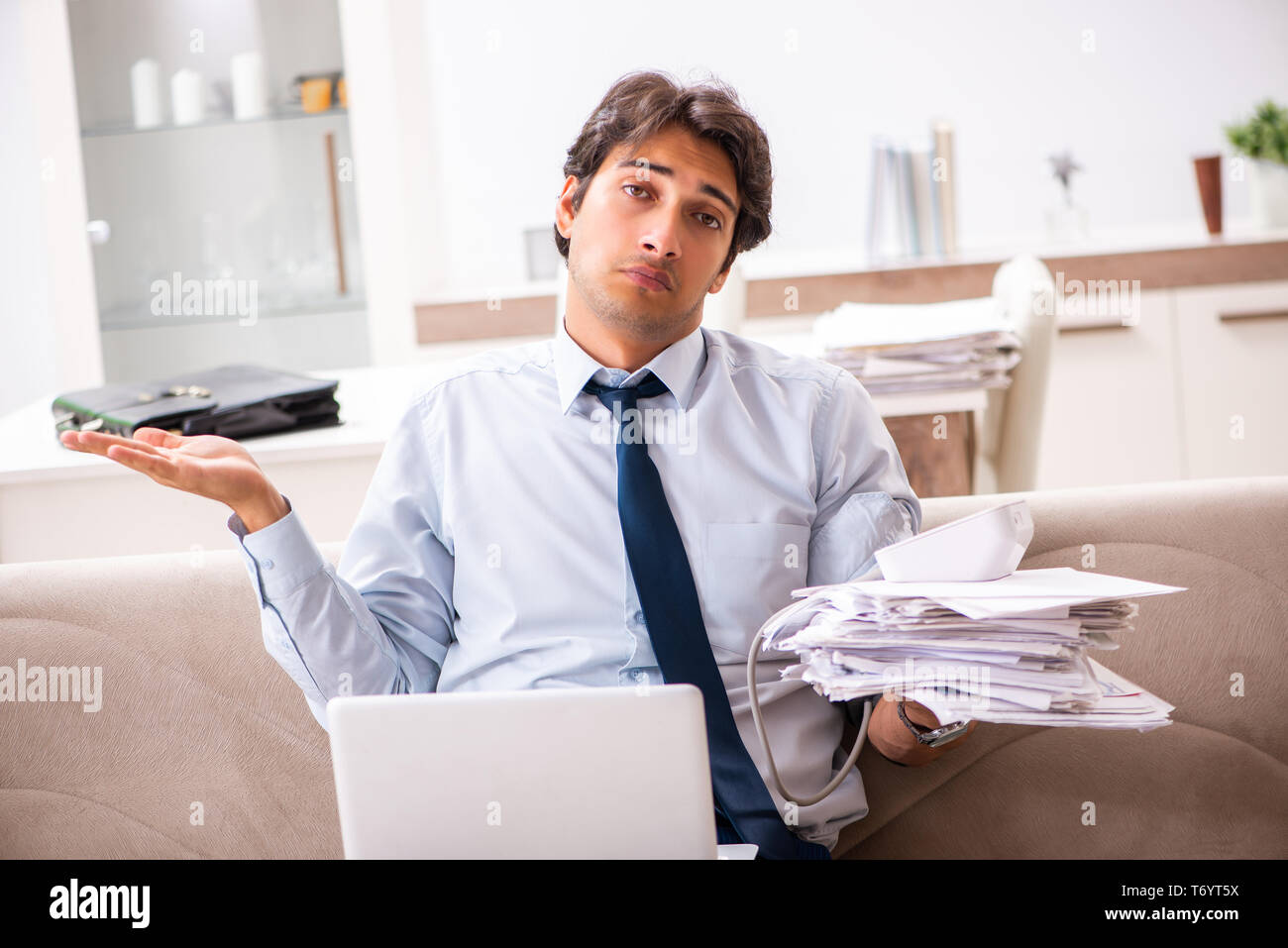 The man under stress measuring his blood pressure Stock Photo - Alamy