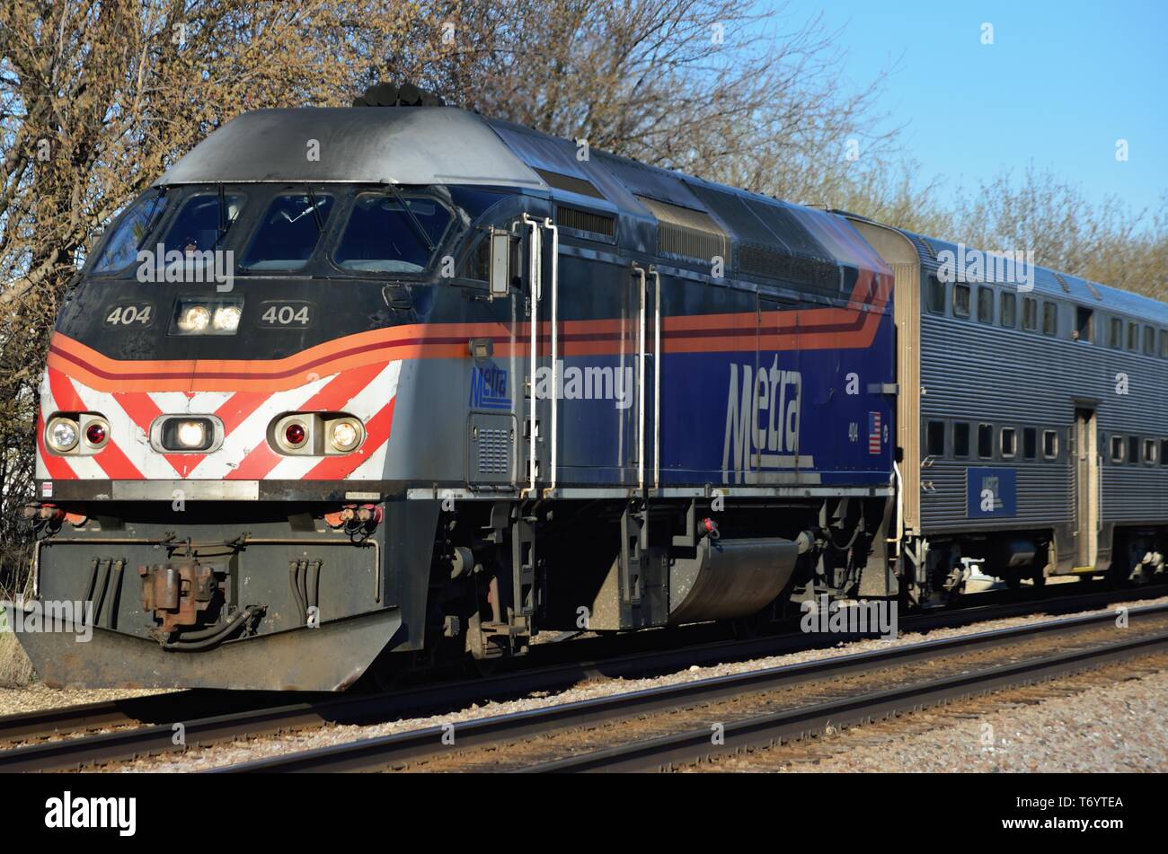 Bartlett, Illinois, USA. A Metra locomotive leading a commuter train ...