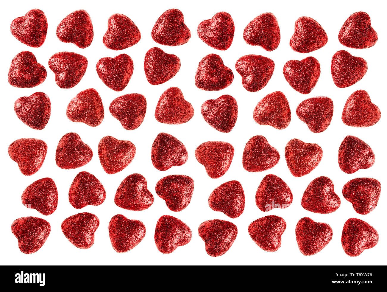 Many small glitter red hearts isolated on white background - love and ...