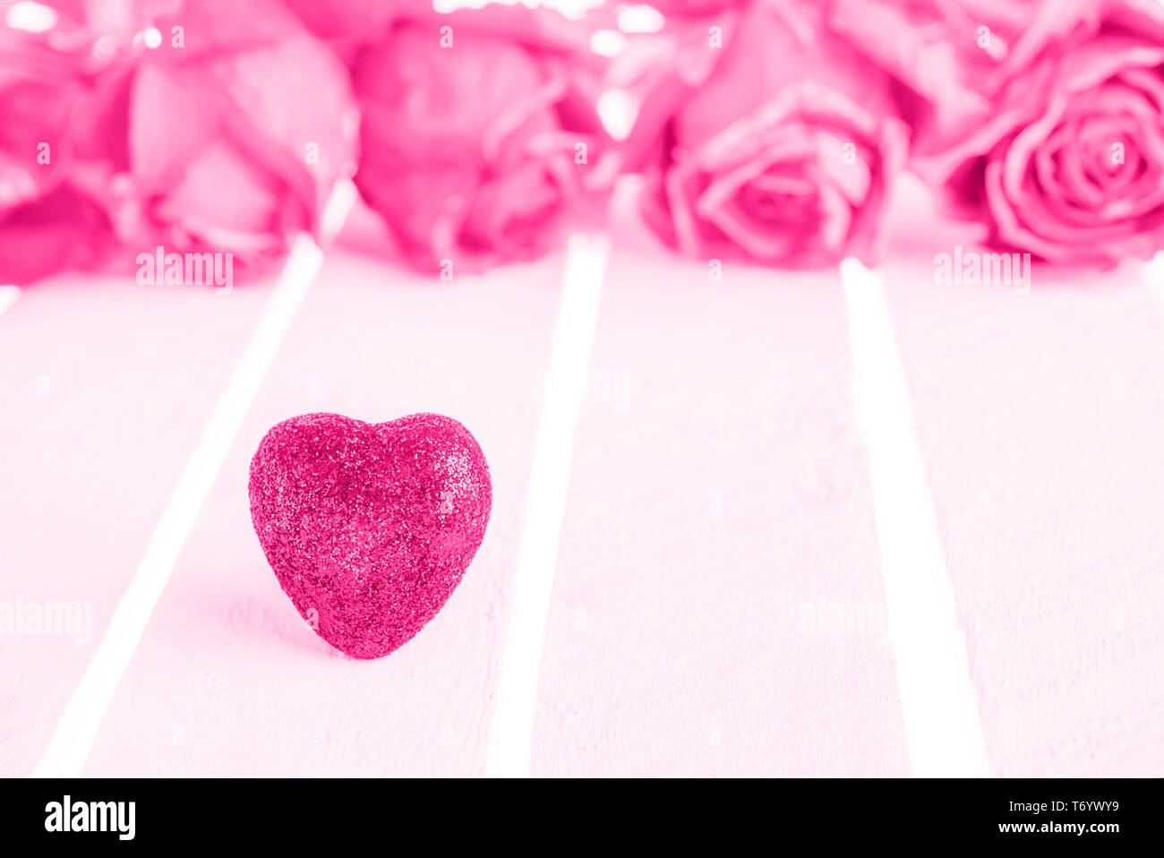 Pink hearts and rose on white wood background Stock Photo - Alamy