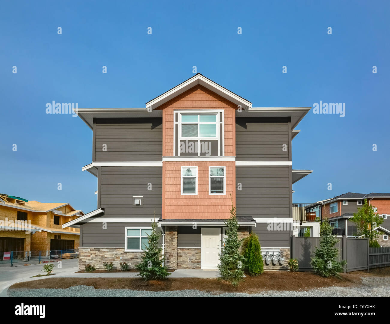 Side entrance door of brand new residential triplex townhouse Stock ...