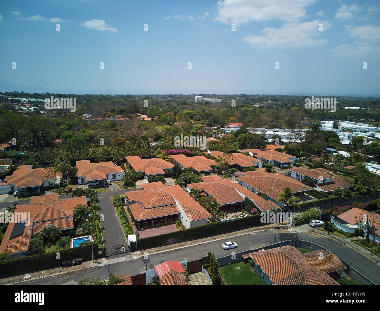 Roofs of modern houses in modern residential above top view Stock Photo ...