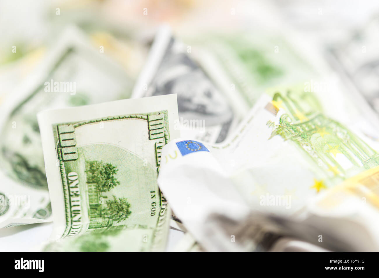 Fake dollars and euro crumpled money background Stock Photo - Alamy