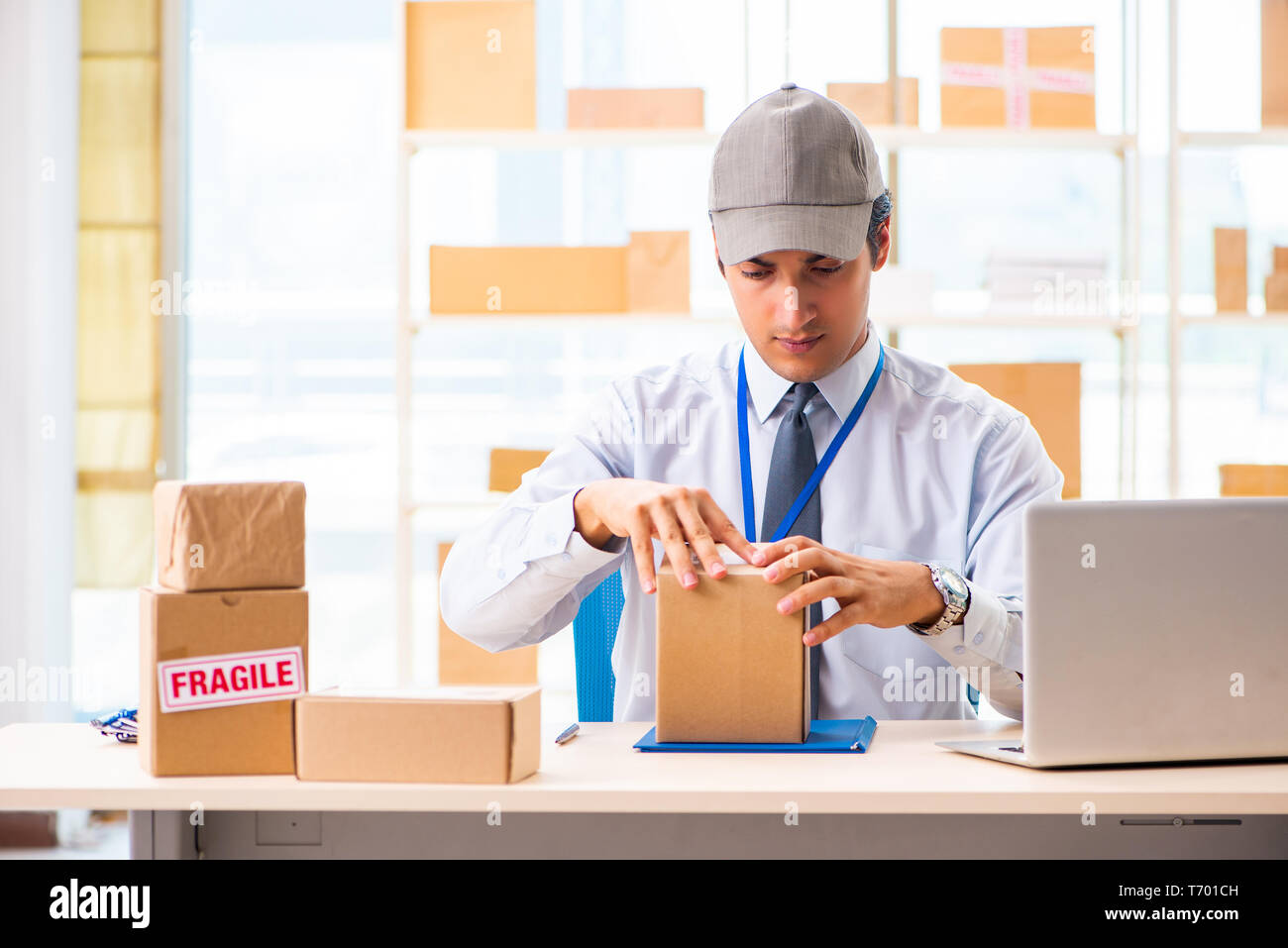 Warehouse employee packing box in hi-res stock photography and images ...