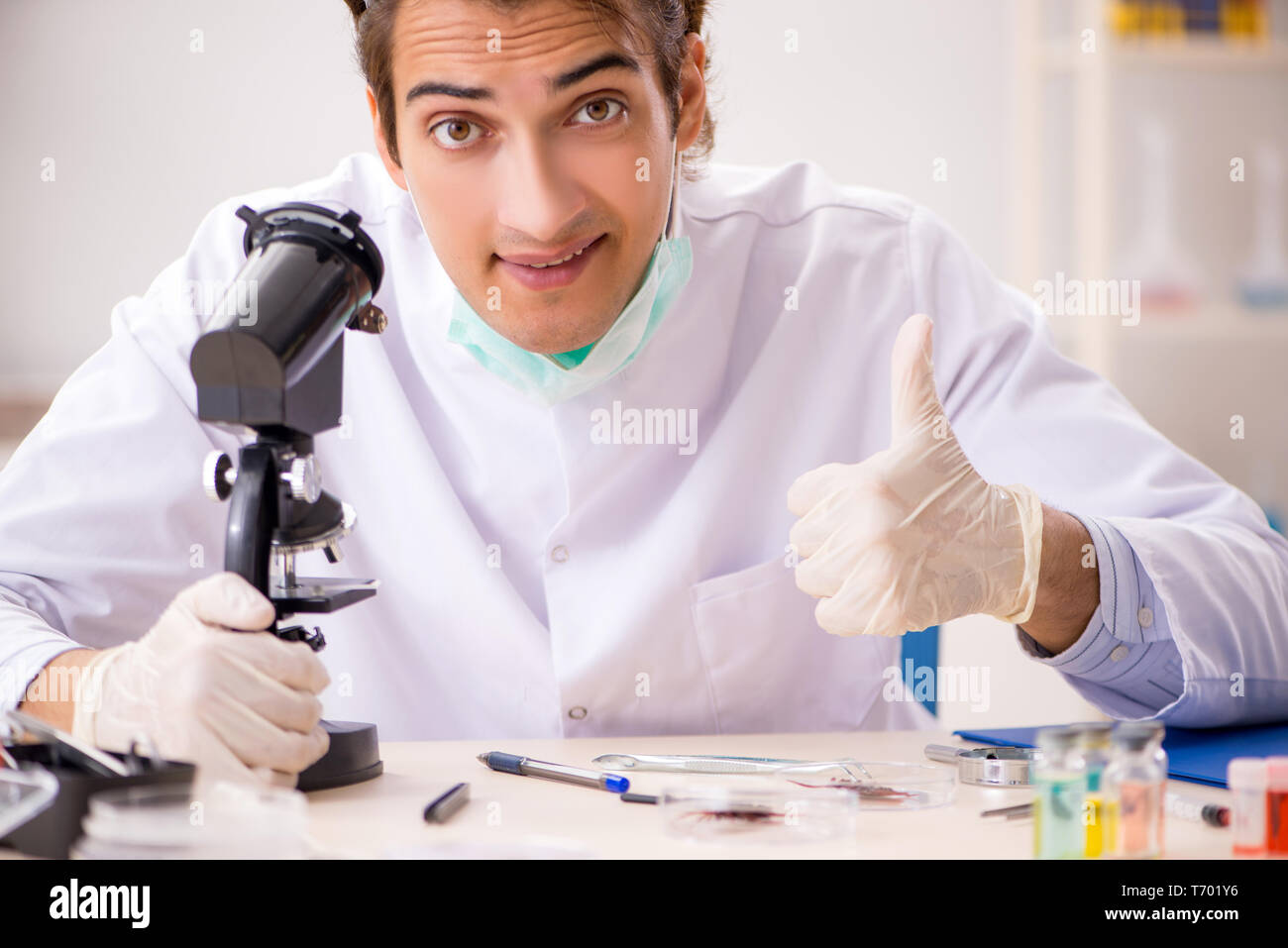 Male entomologist working in the lab on new species Stock Photo - Alamy