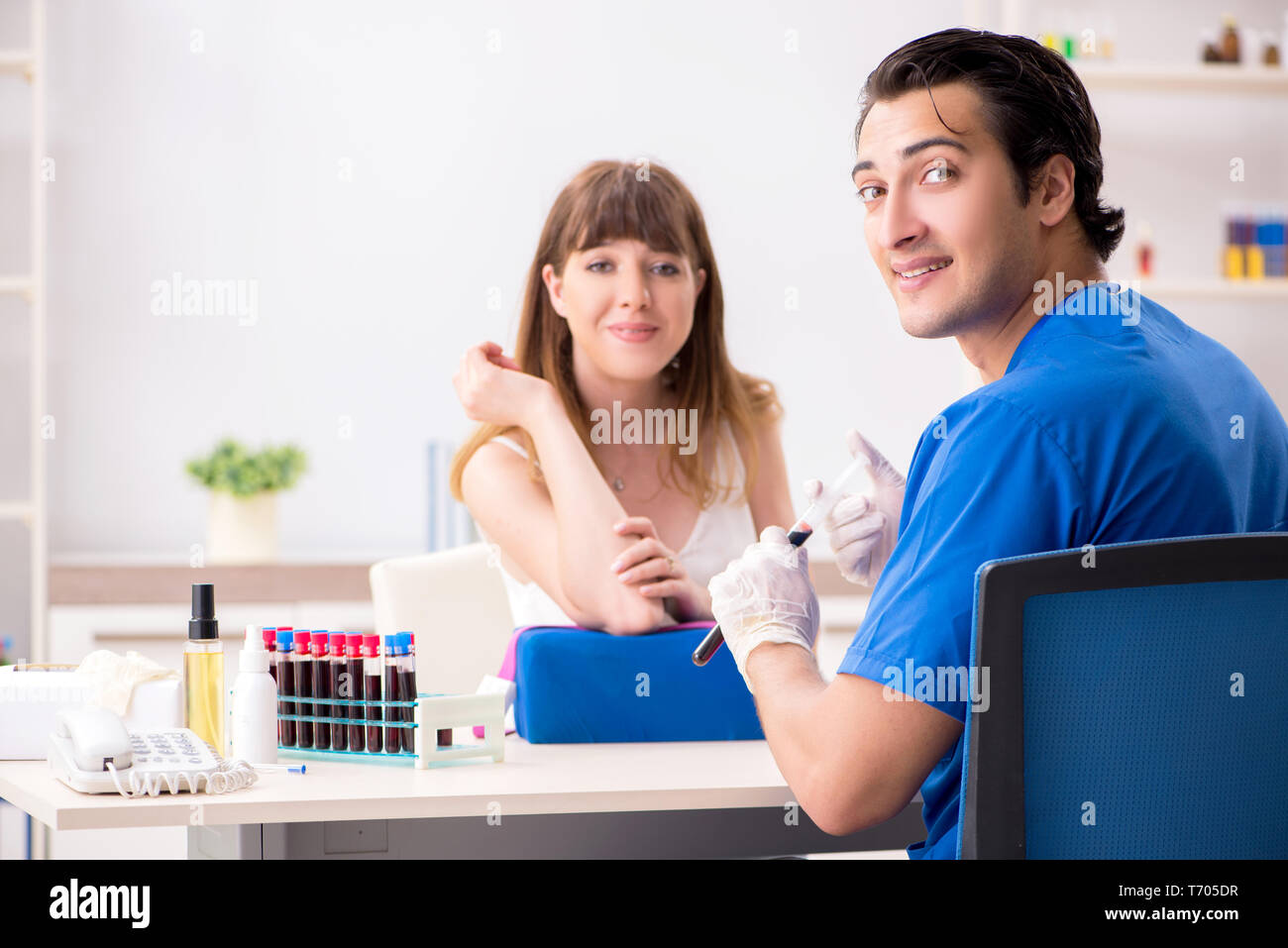 Young patient during blood test sampling procedure Stock Photo - Alamy