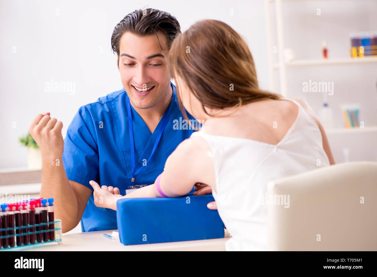 Young patient during blood test sampling procedure Stock Photo - Alamy