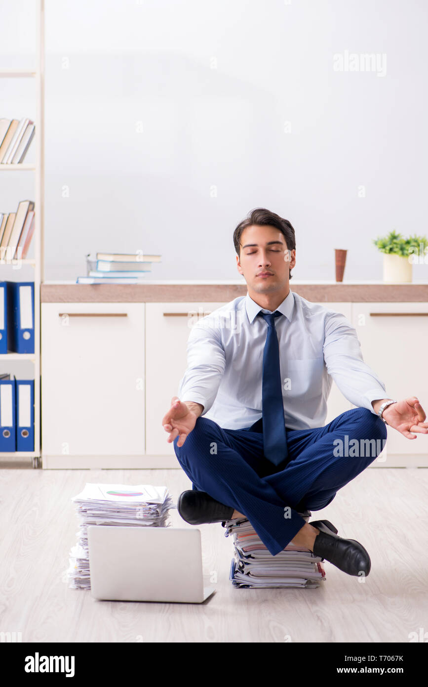 Extremely busy employee working in the office Stock Photo - Alamy