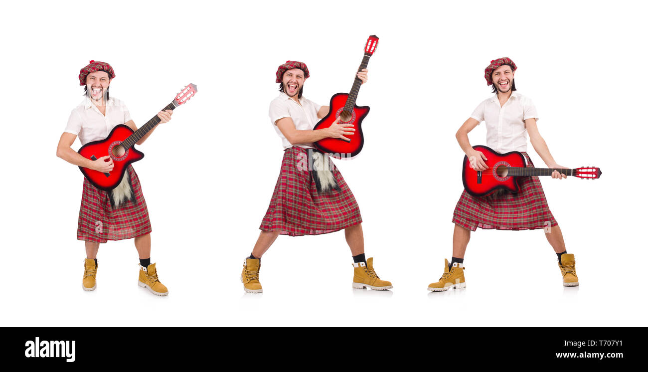 The scotsman playing guitar isolated on white Stock Photo - Alamy