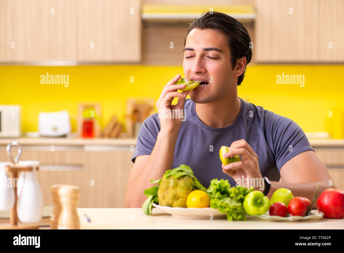 The young man in dieting and healthy eating concept Stock Photo - Alamy