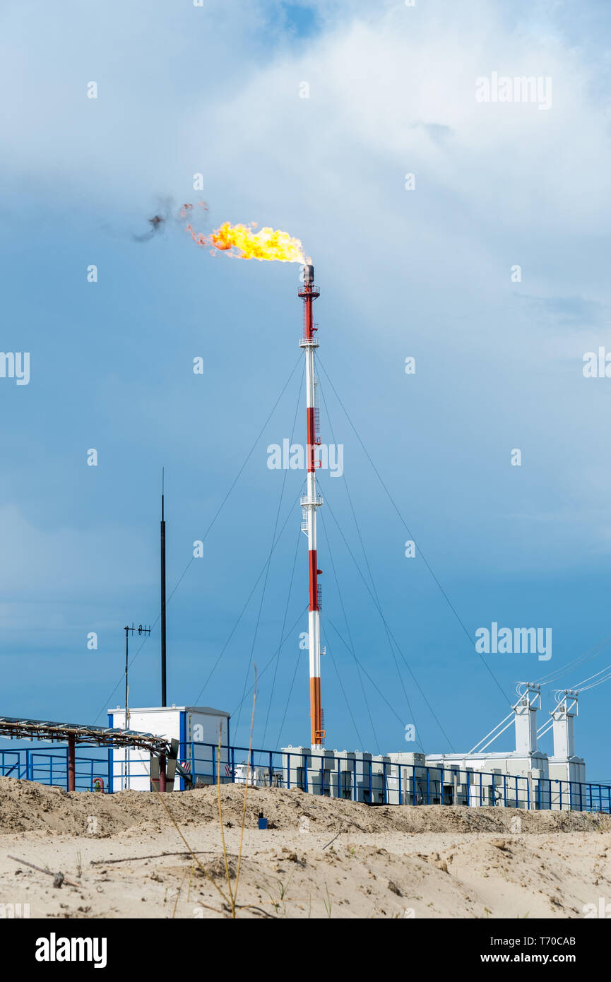 Oil refinery fire gas torch. Petroleum concept Stock Photo - Alamy