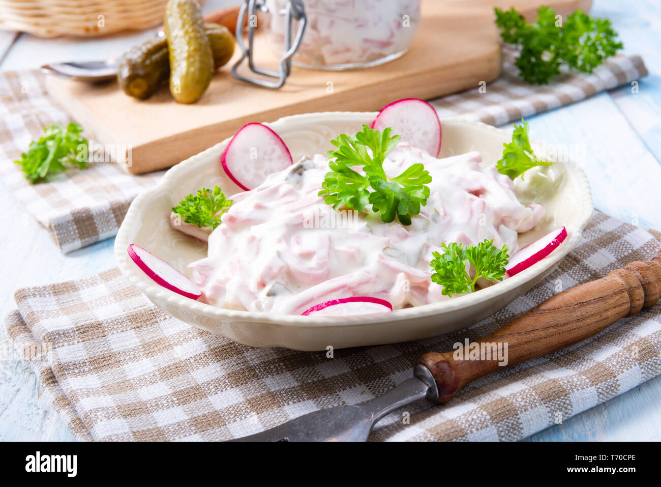 delicious homemade meat salad with mayonnaise and cucumber Stock Photo ...