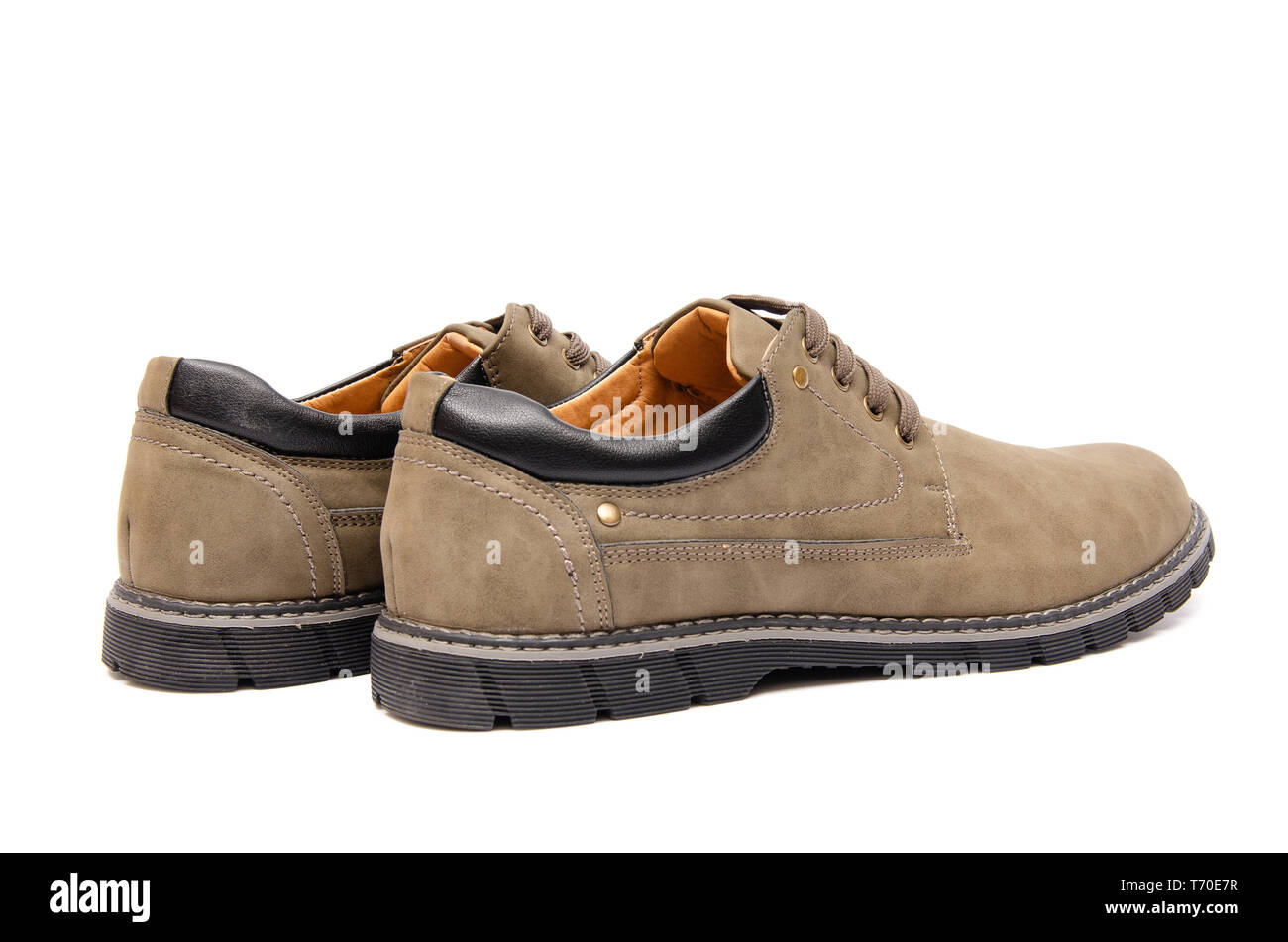 Brown suade shoes isolated on white background Stock Photo - Alamy