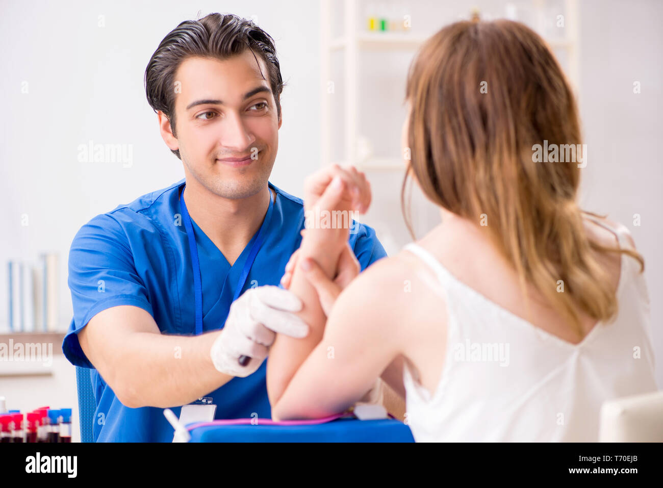 Young patient during blood hi-res stock photography and images - Alamy