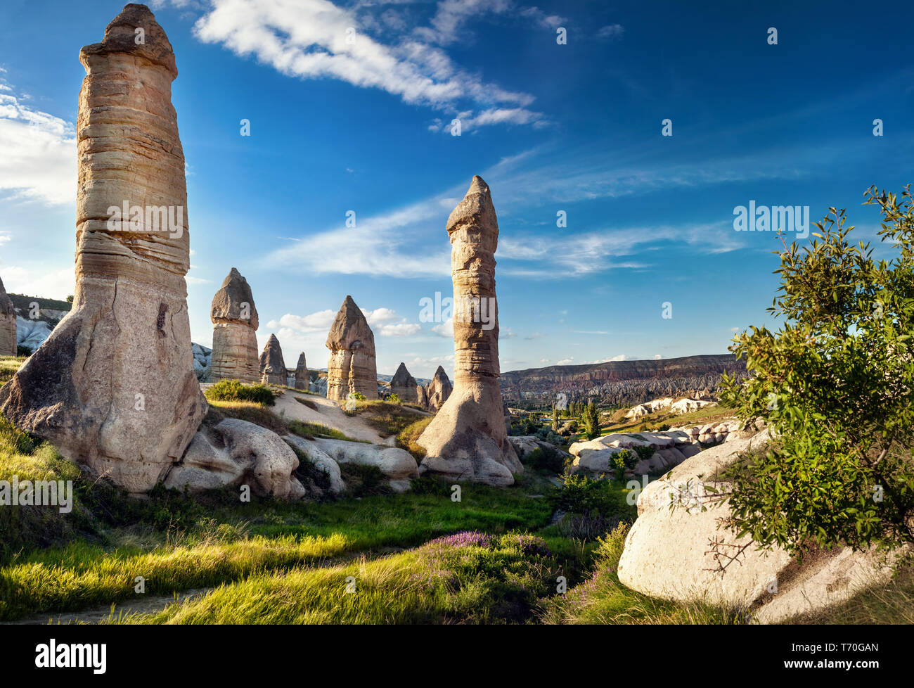 Ancient geological formation called fairy chimneys at sunset in ...