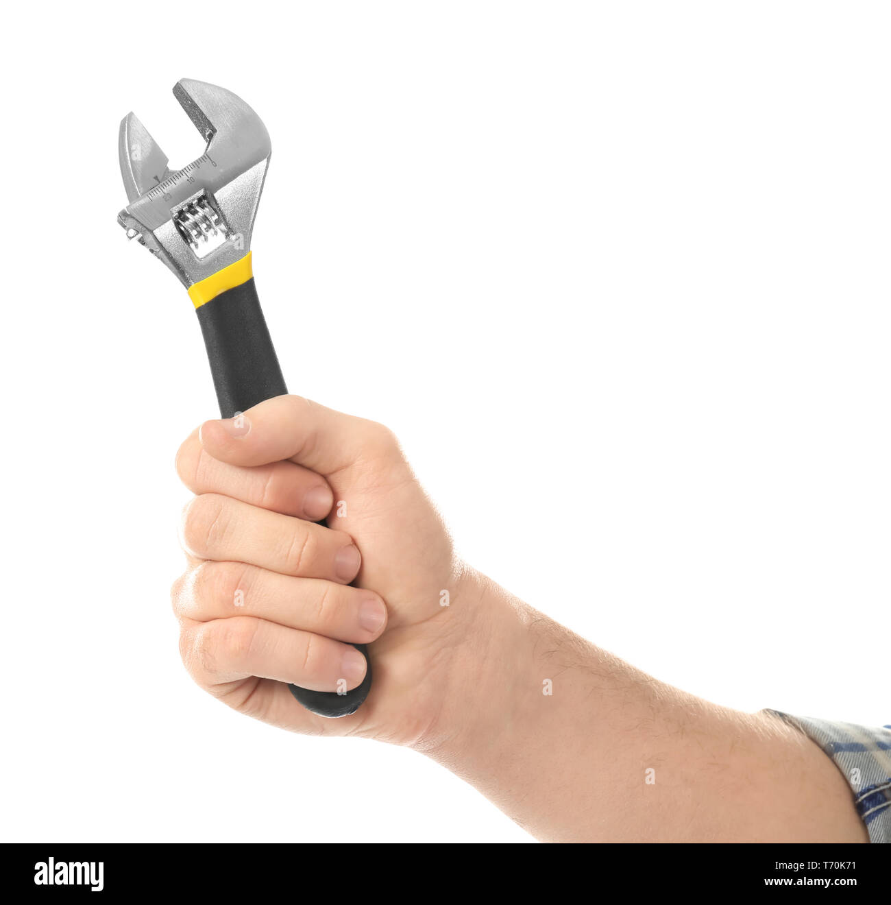 Hand of car mechanic holding adjustable wrench on white background ...