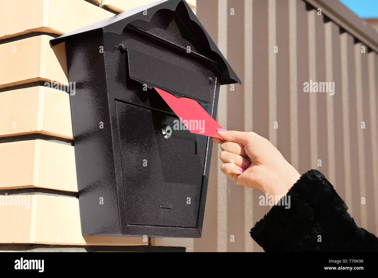 Putting letter in hi-res stock photography and images - Alamy