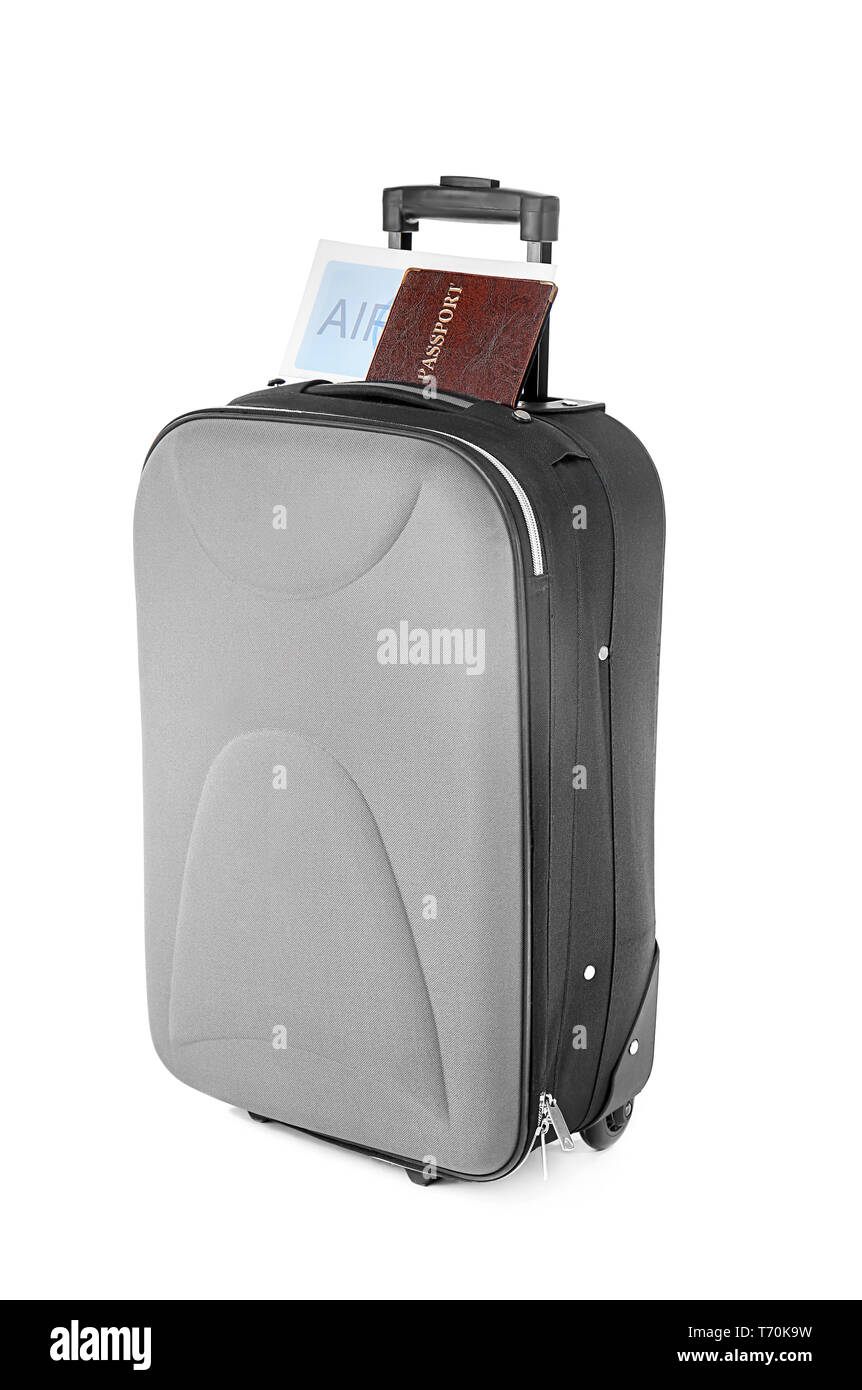 Large suitcase and documents on white background Stock Photo - Alamy