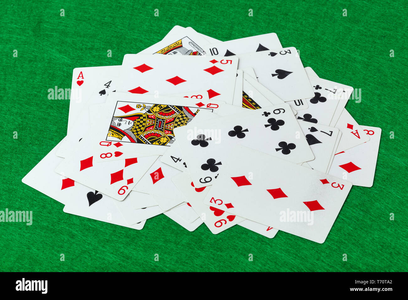 Playing cards on table hi-res stock photography and images - Alamy