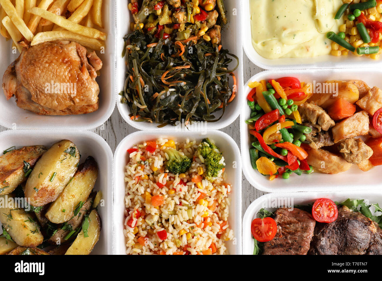 Plastic containers with delicious food as background. Delivery service ...