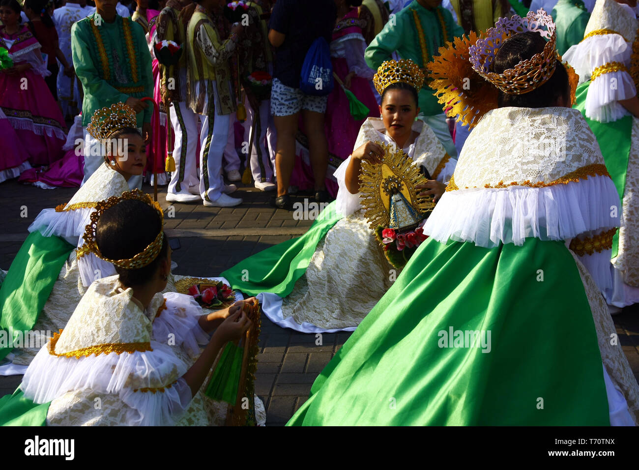 ANTIPOLO CITY, PHILIPPINES - MAY 1, 2019: Parade participants in their ...