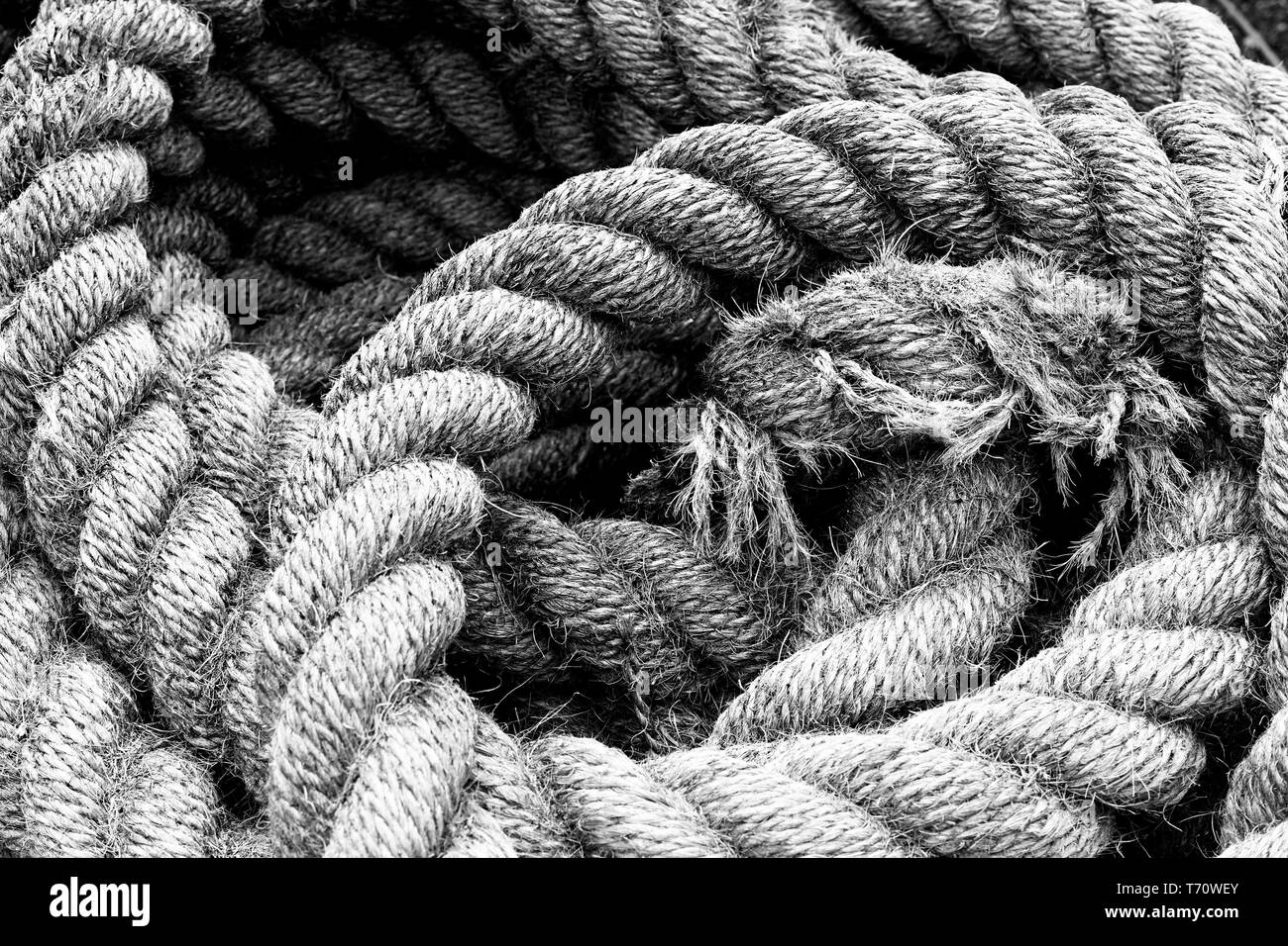Rope coiled Black and White Stock Photos & Images - Alamy