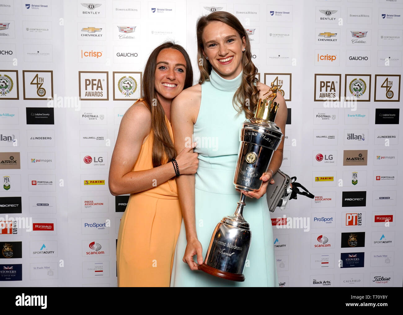 Arsenal's Vivianne Miedema (right) poses with her Women's PFA Player of ...