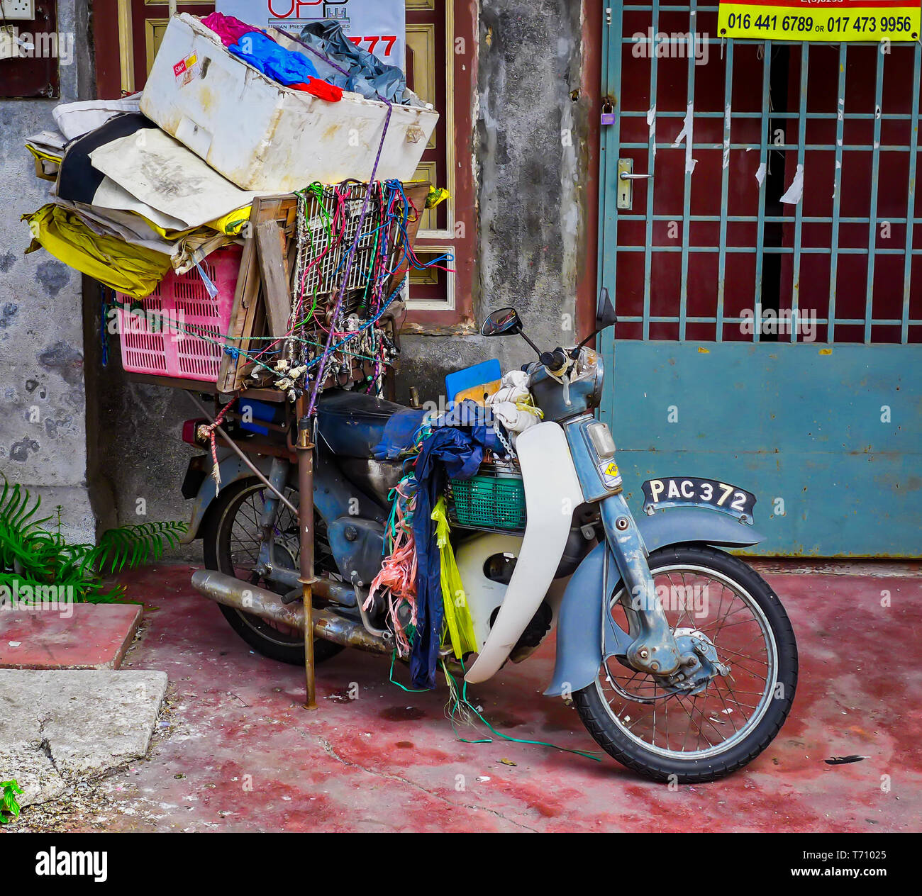 Malaysia moped hi-res stock photography and images - Alamy