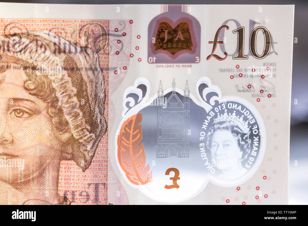 Close-up, macro photo of piece of £10 banknote. Ten pounds sterling ...