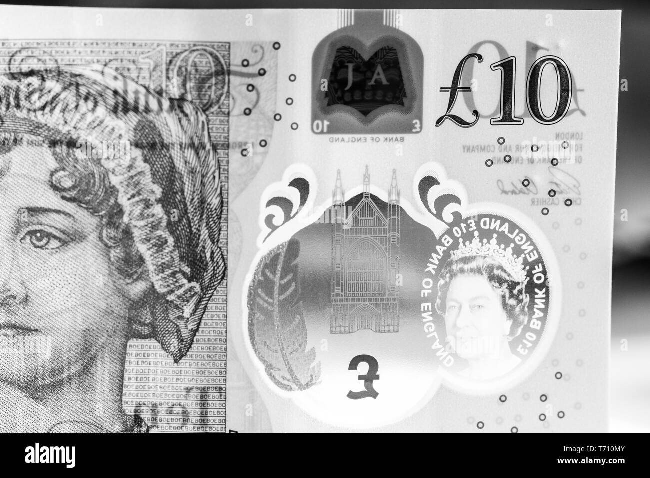 Close-up, macro photo of piece of £10 banknote. Ten pounds sterling ...