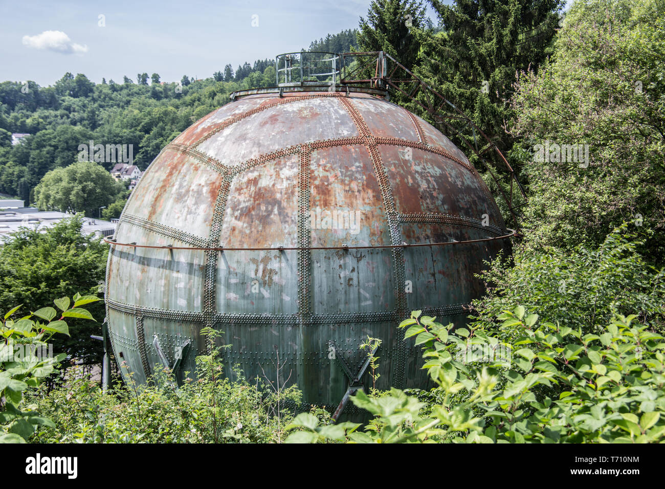metallic ball as gas tank in the forest Stock Photo - Alamy