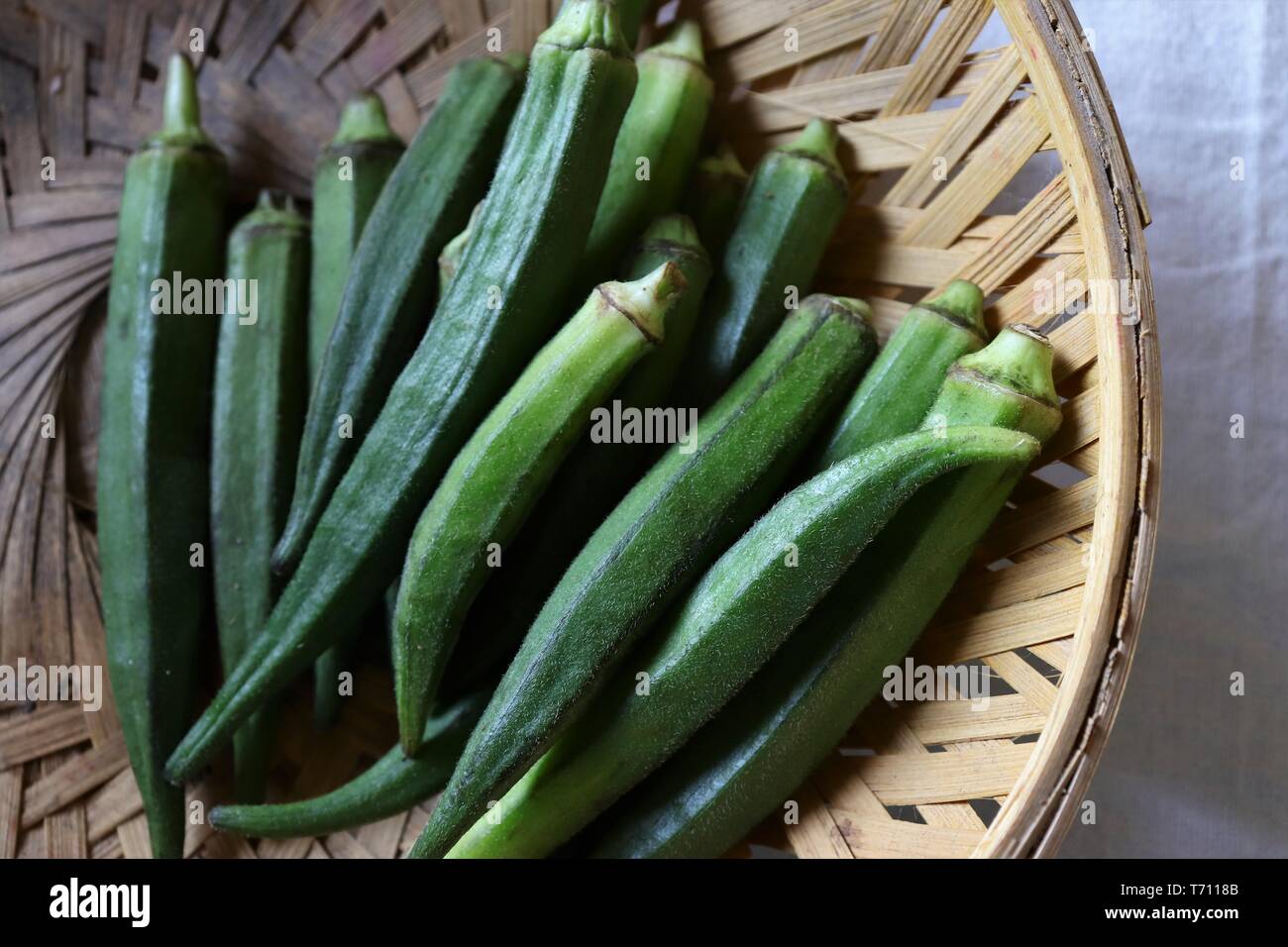 Okra in basket hi-res stock photography and images - Alamy