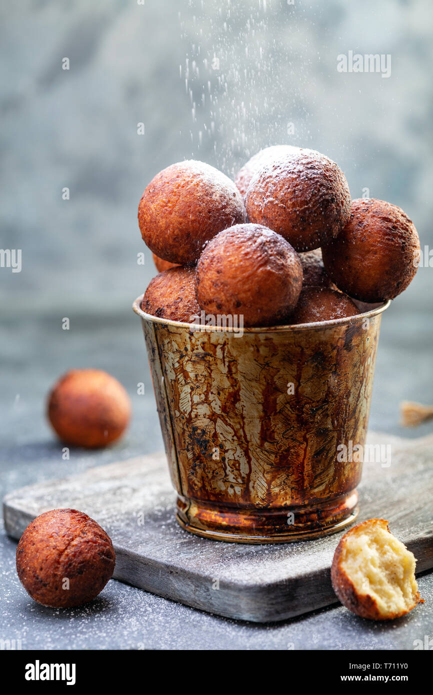 Cottage cheese doughnuts in an old bucket Stock Photo - Alamy