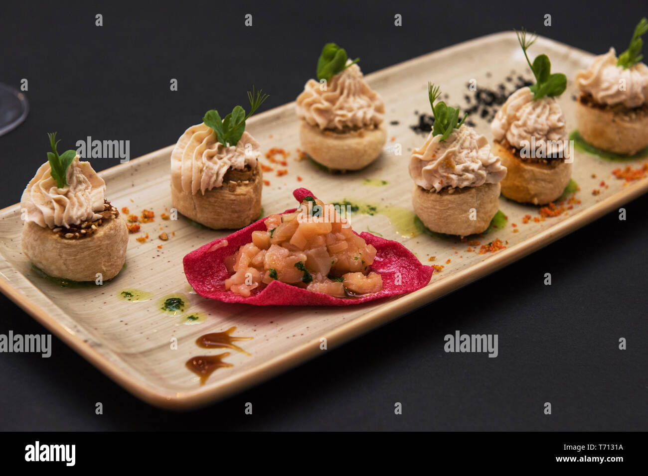 Kegs with salmon fish and cream sauce Stock Photo - Alamy