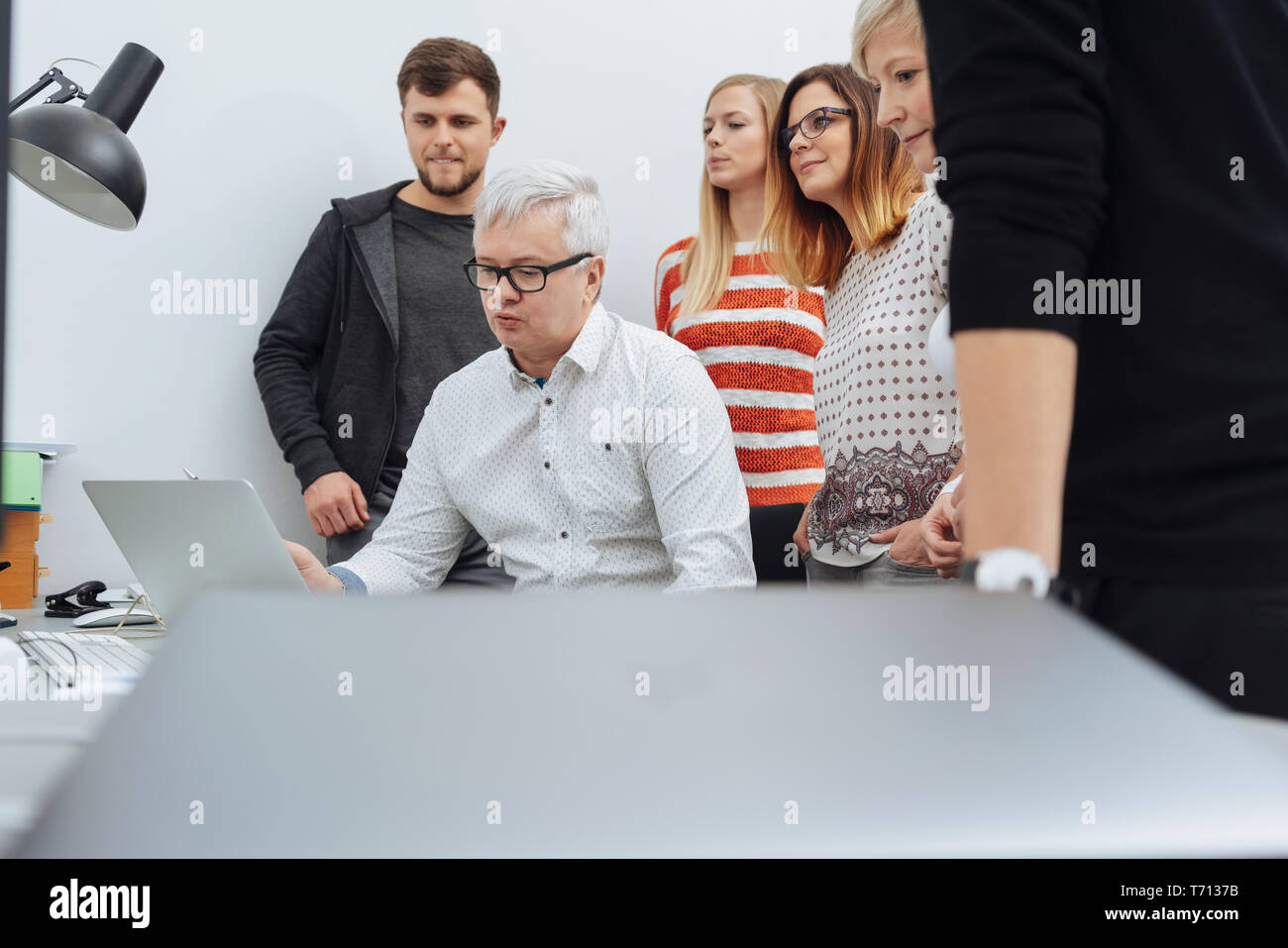 Women gathered around hi-res stock photography and images - Alamy