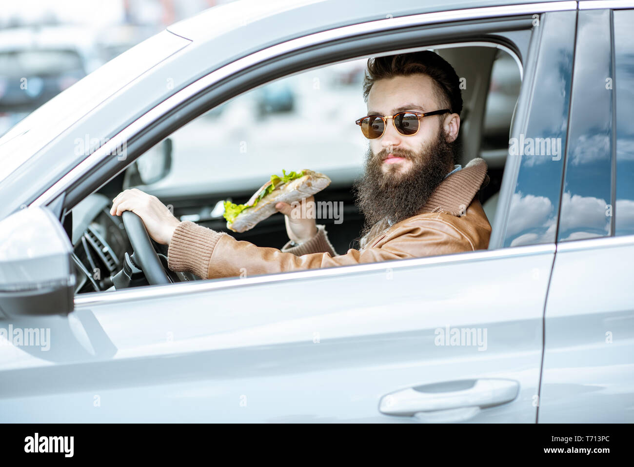 Cool guy in car hi-res stock photography and images - Alamy