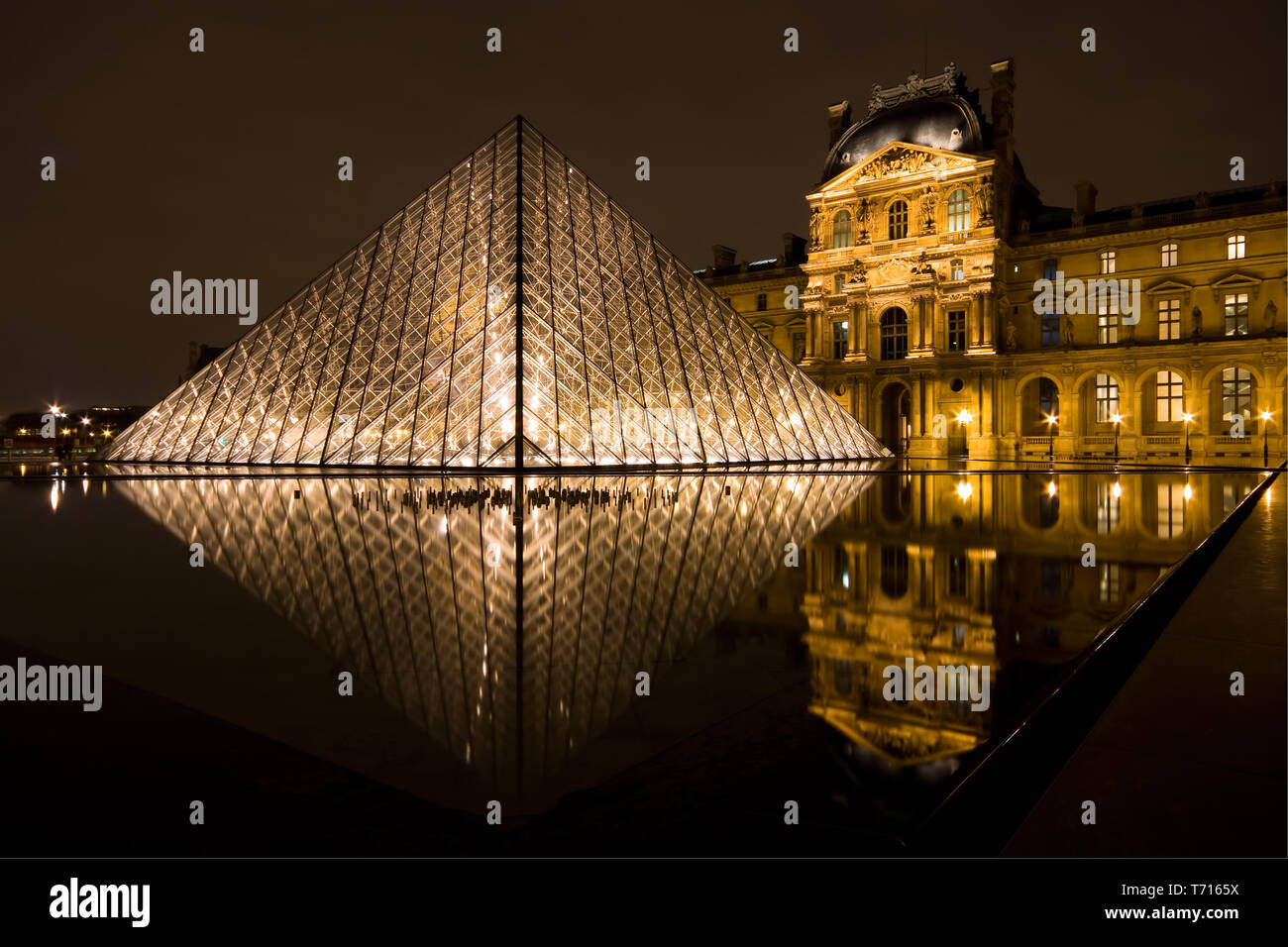 The iconic Louvre at night, taken with a long exposure technique Stock ...