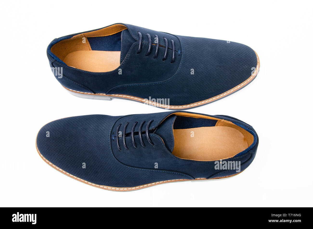 Blue suede shoes isolated on white background Stock Photo - Alamy