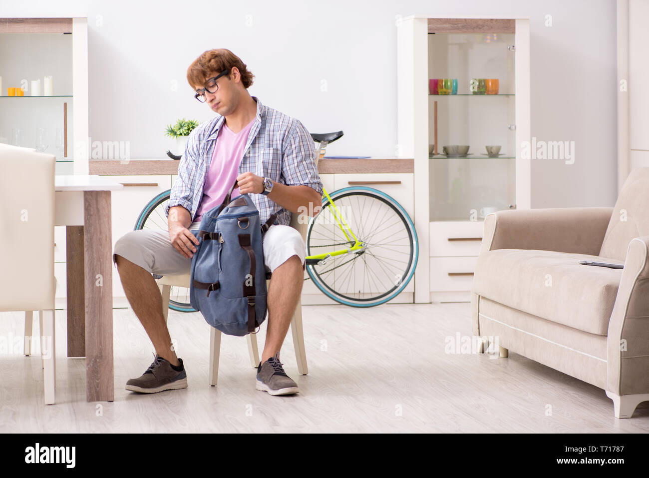 Student commuting to university using cycle Stock Photo - Alamy