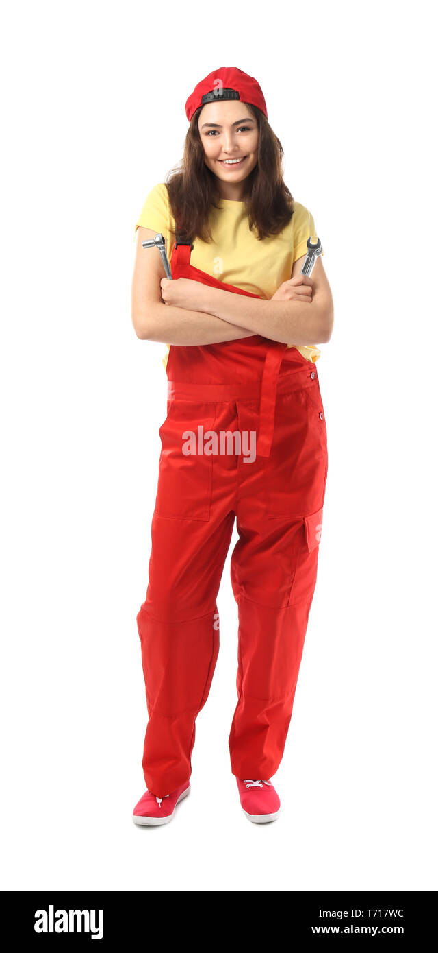 Female mechanic in uniform with instruments on white background Stock ...