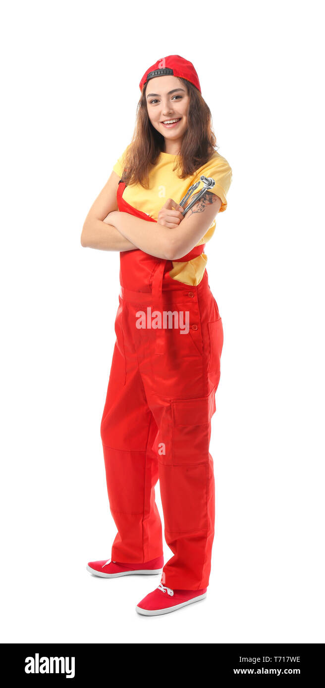 Female mechanic in uniform with instruments on white background Stock ...