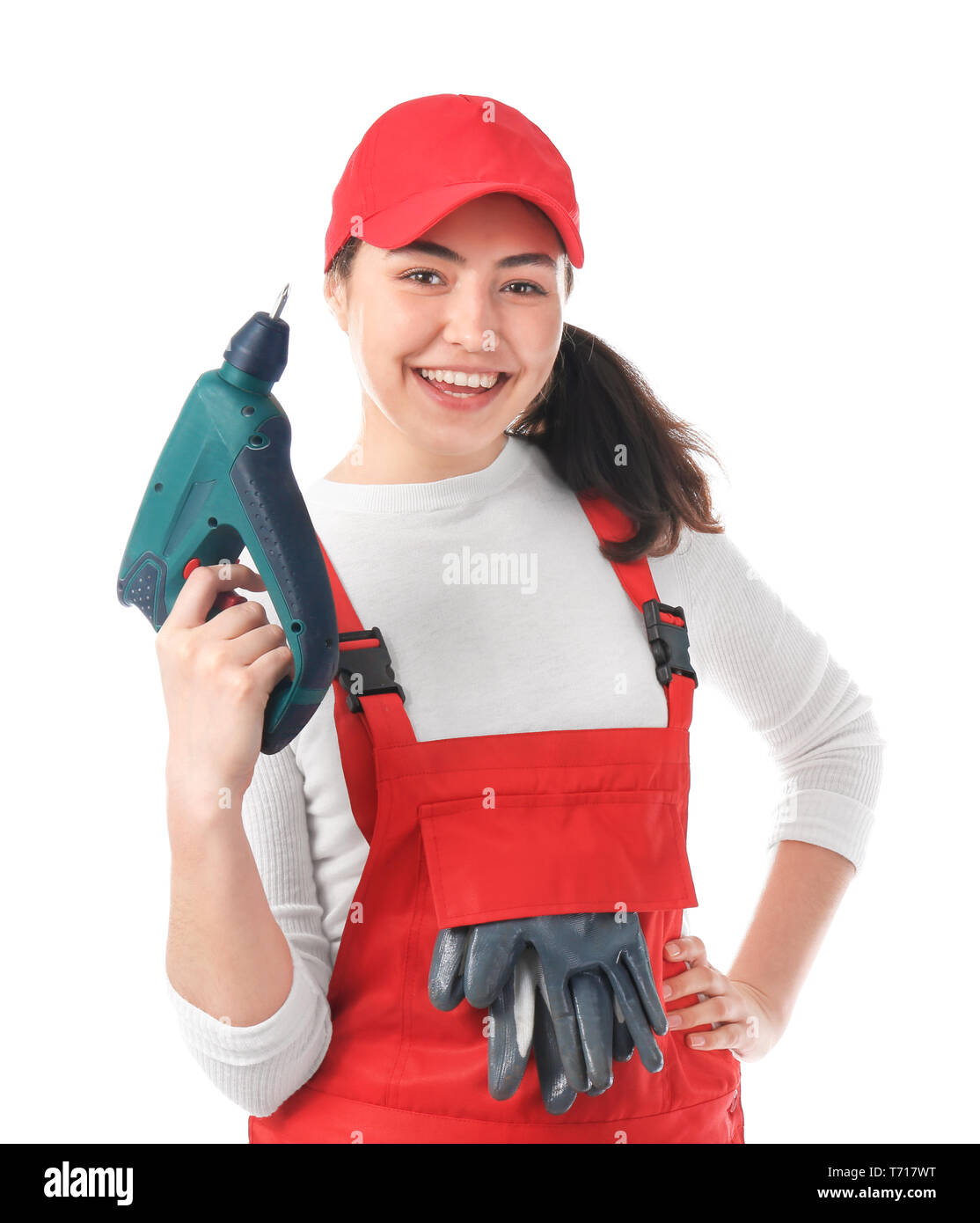 Female mechanic in uniform with drill on white background Stock Photo ...